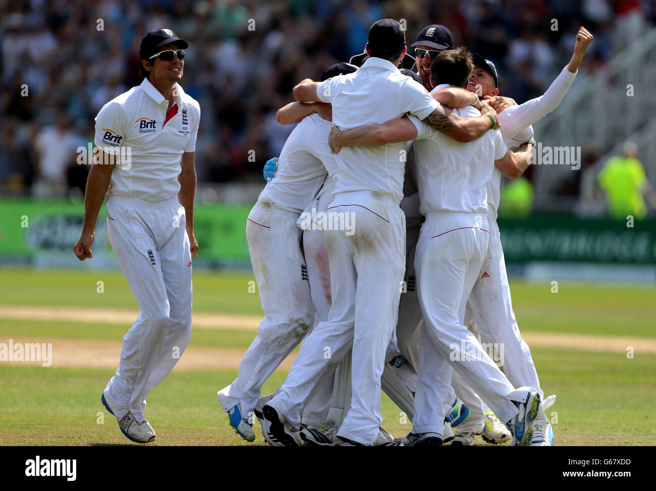 The England team celebrate winning the First Investec Ashes Test match ...