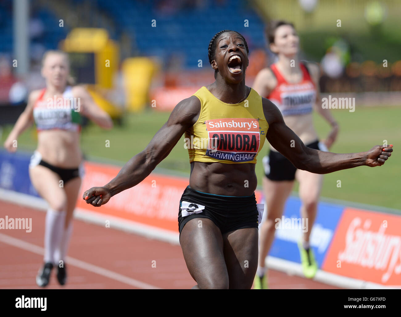 Anyika Onuora celebrates her victory in the Womens 200m Race during the ...