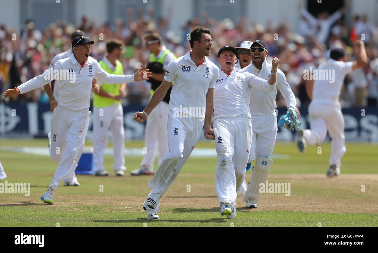 England bowler James Anderson (centre) starts the celebrations as ...