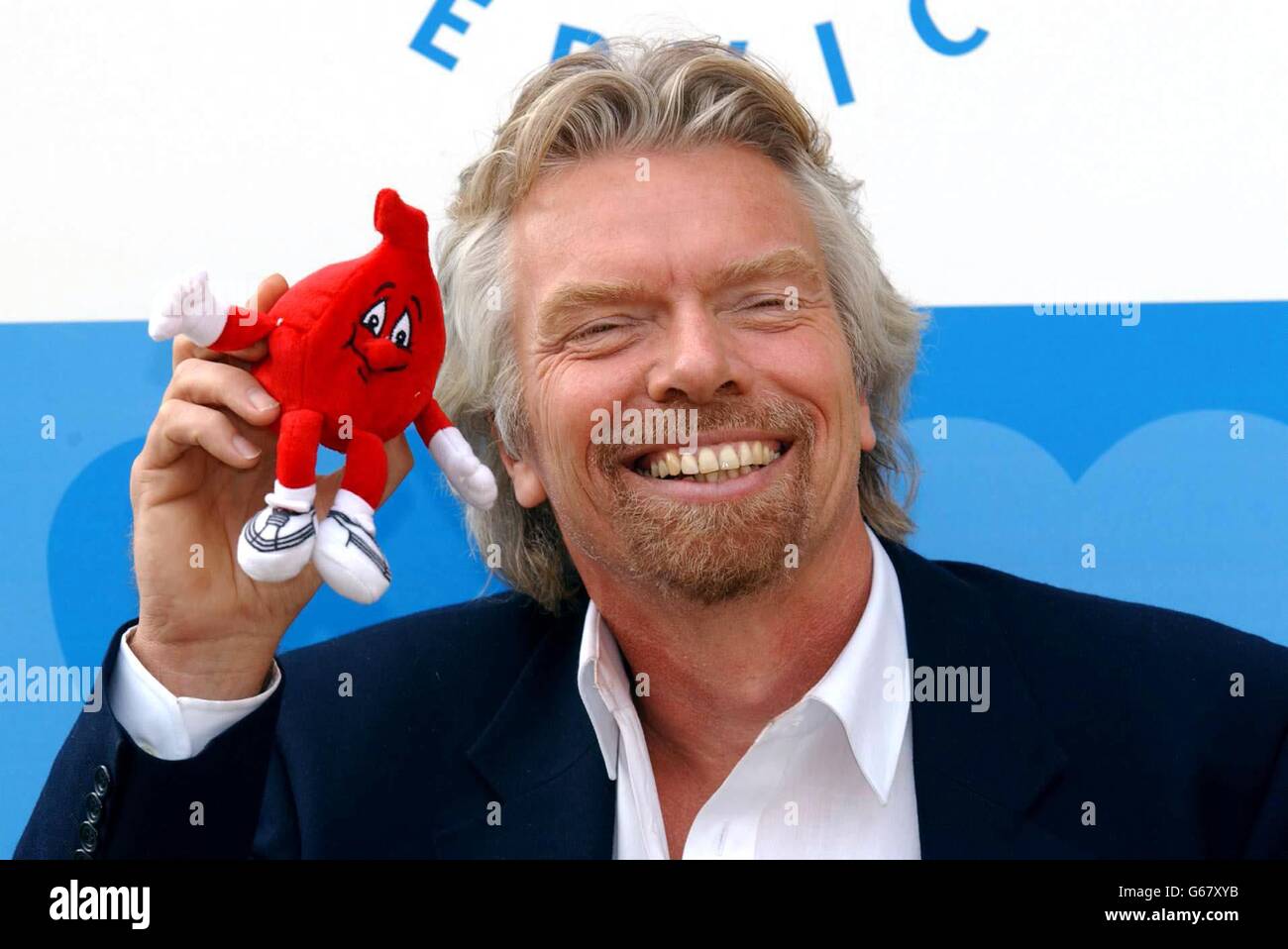 Sir richard branson with mascot billy blood drop hi-res stock ...