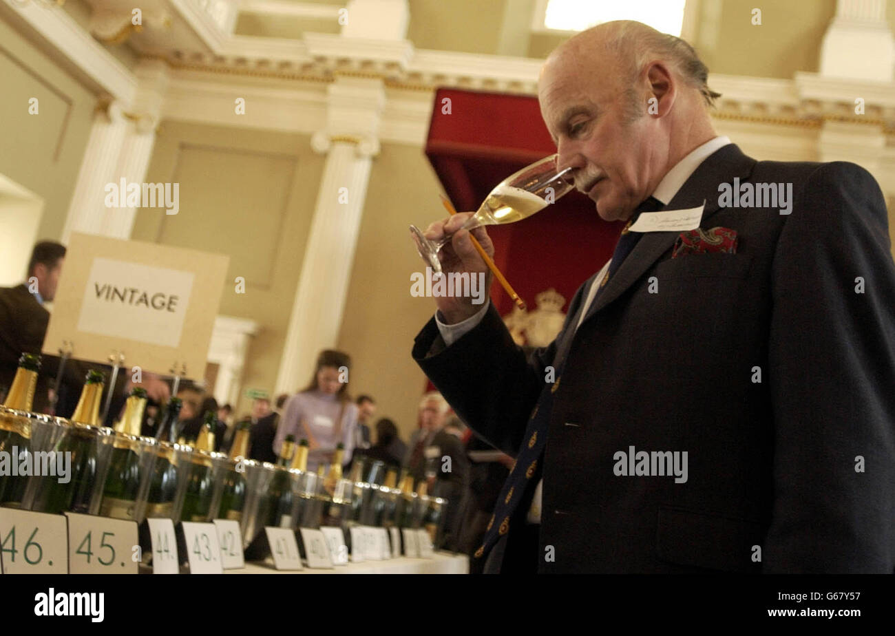 Harold Lievesley, a wine consultant from Cheshire, samples the nose on ...