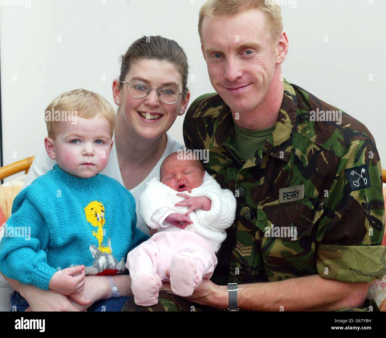 Sgt Perry Returns home for Birth of Daughter Stock Photo - Alamy