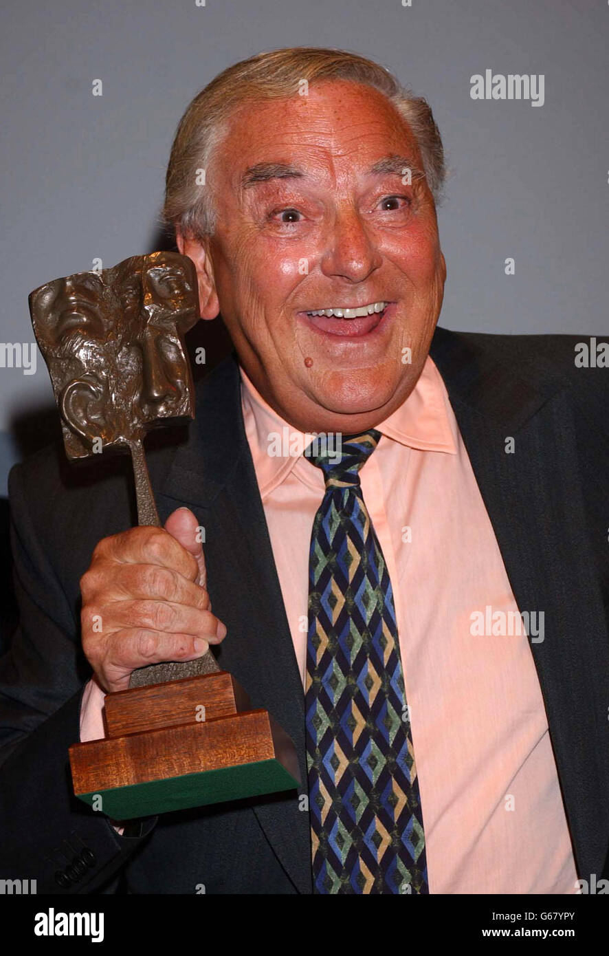 TV personality Bob Monkhouse with his TRIC Special Award during the ...