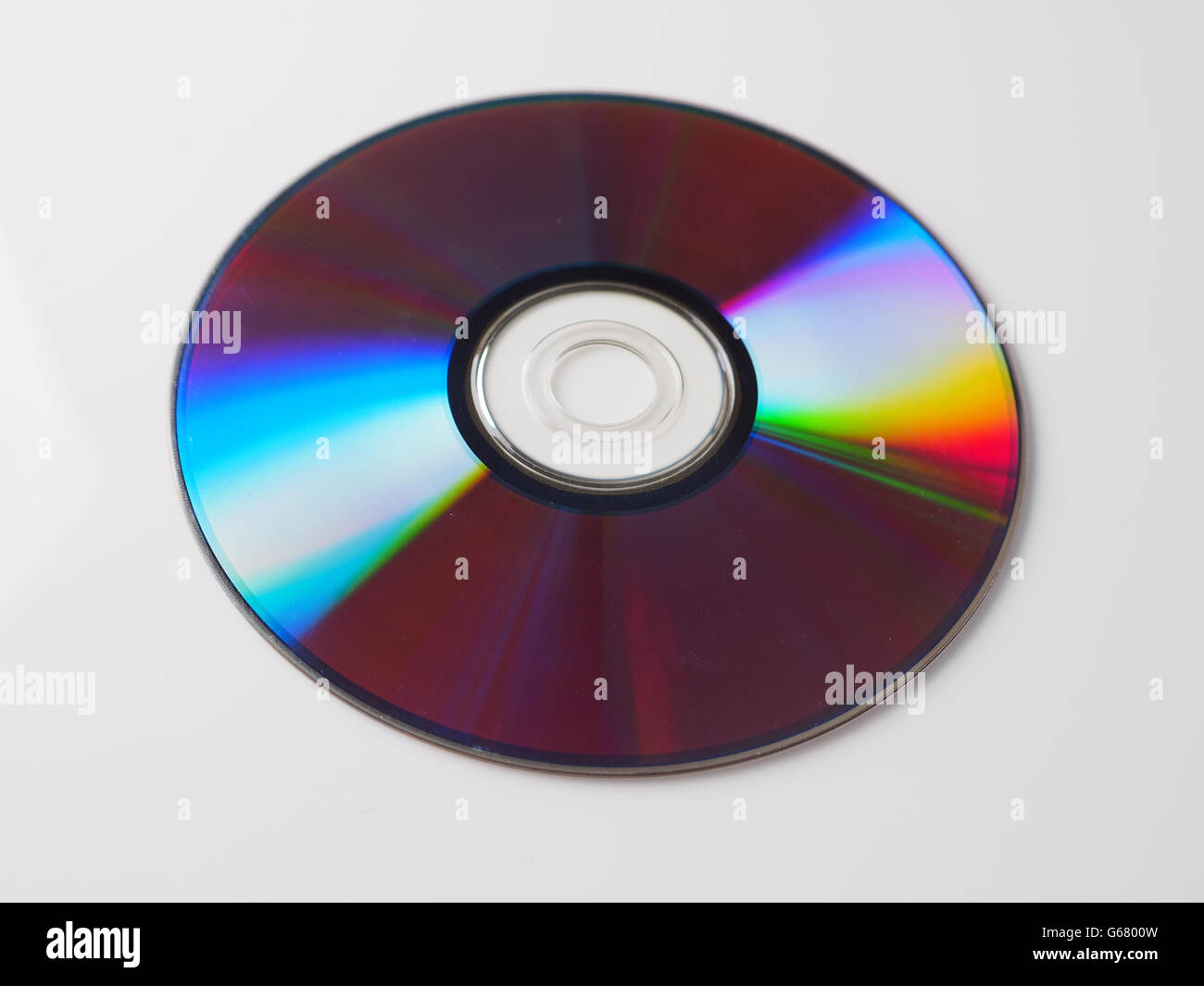 DVD disk on a gray background Stock Photo - Alamy