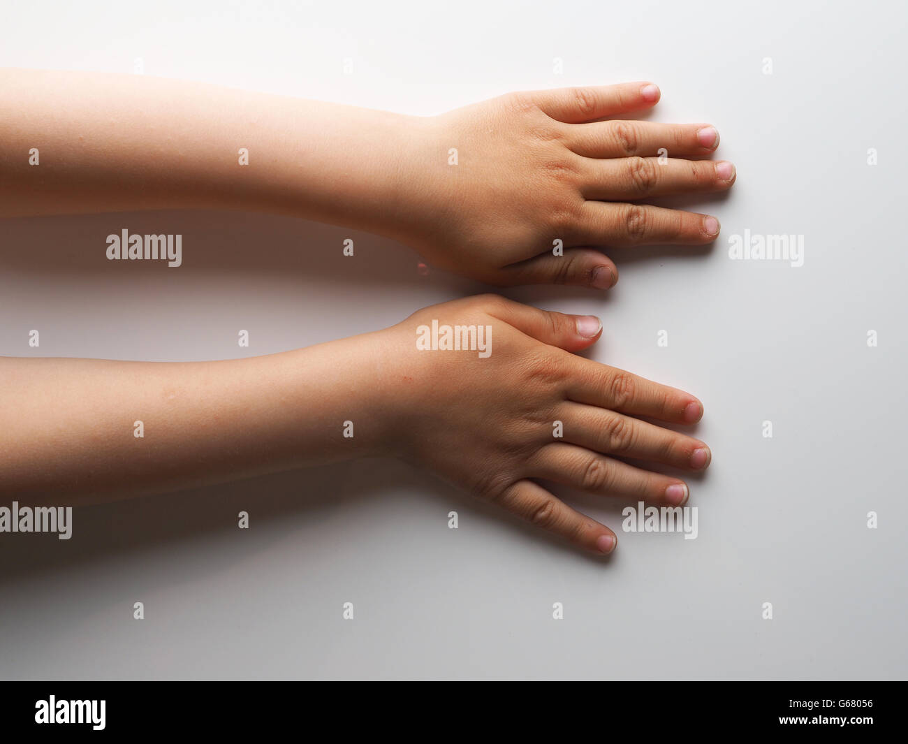 child hands on a gray background Stock Photo - Alamy
