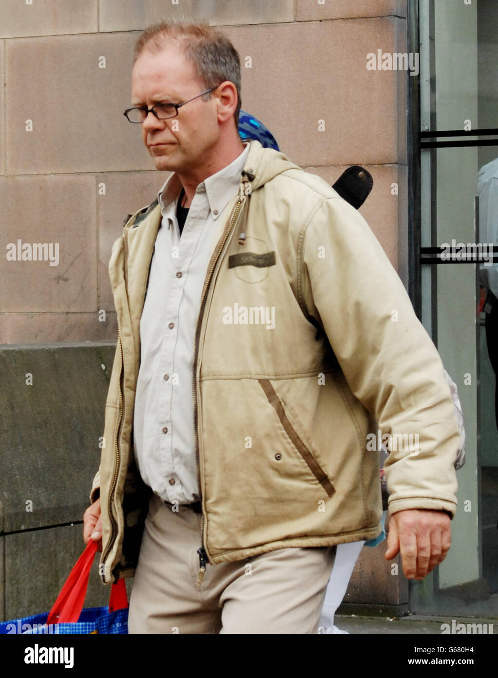 Kevin Wright, 49, leaves Nottingham Crown Court, where he is accused of ...