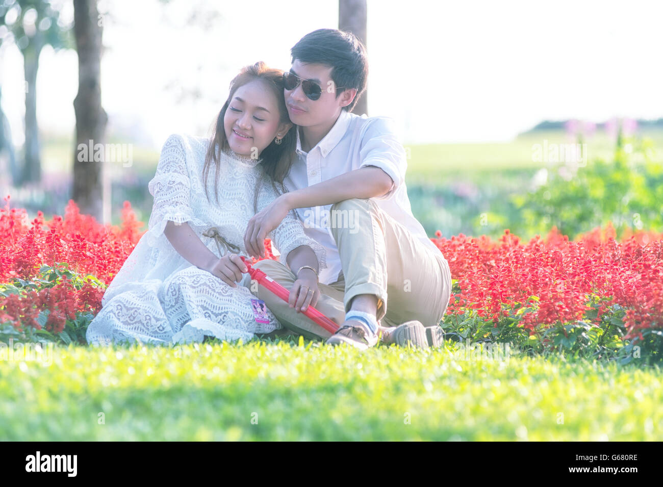 asia happy young couple in love outdoor in spring Stock Photo - Alamy