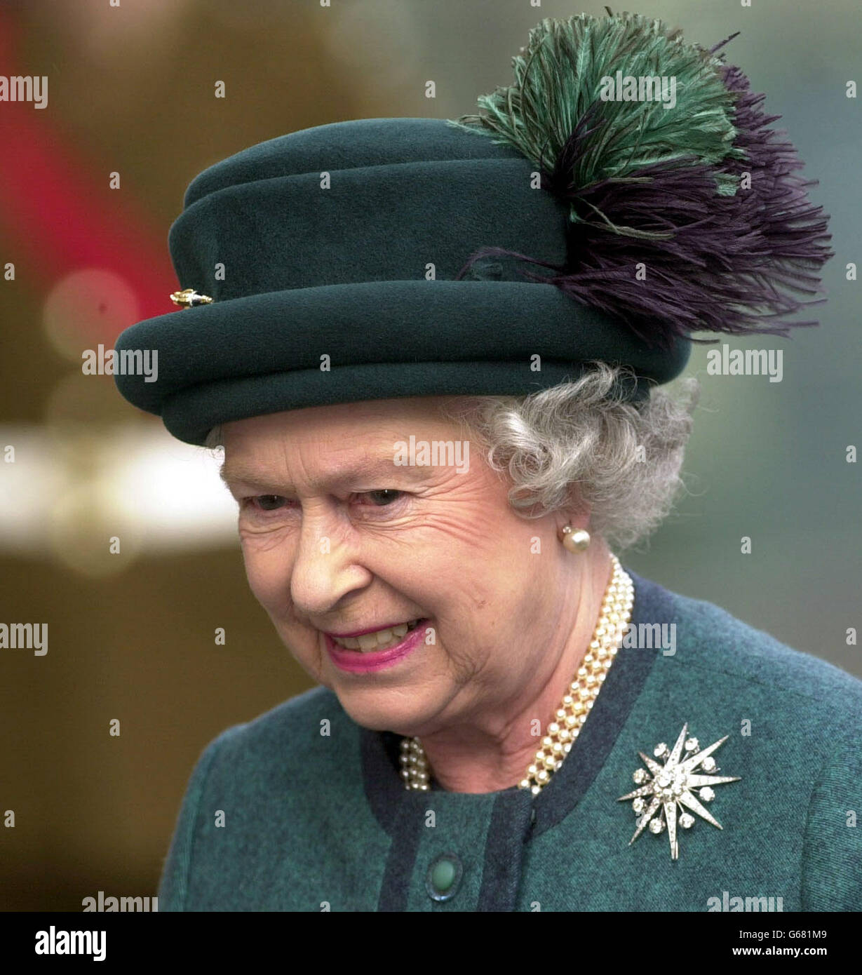 Queen Elizabeth II arriving at Langanside Court buildings, in Belfast ...