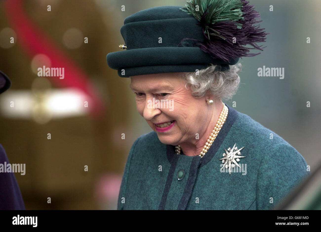 Queen Elizabeth II arriving at Langanside Court buildings, in Belfast ...