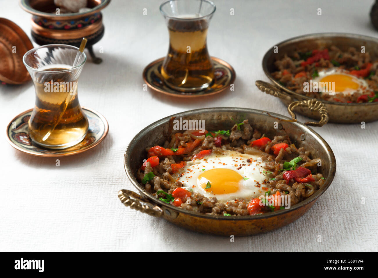 Fried egg with mince meat in traditional turkish pan Stock Photo - Alamy