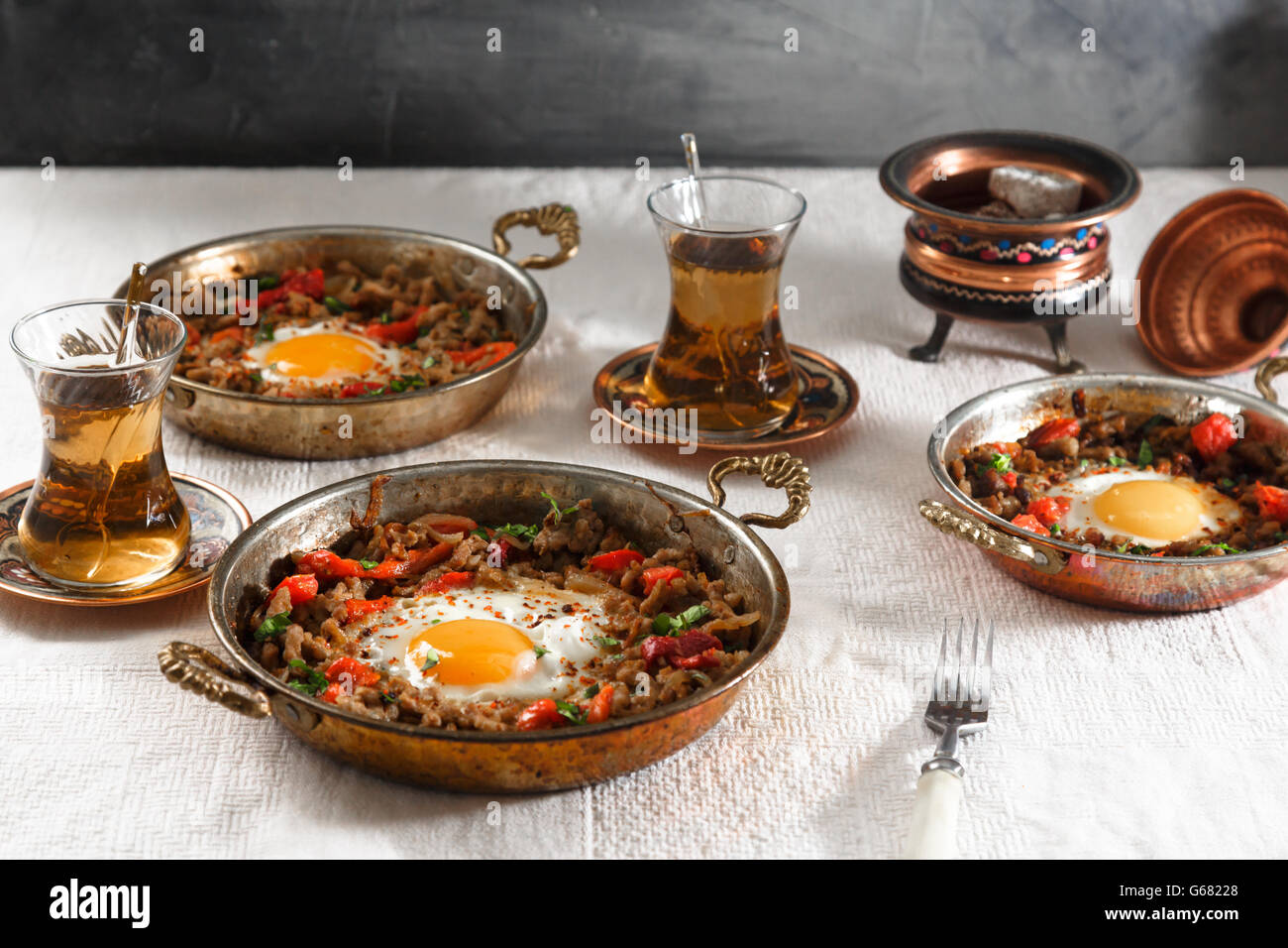 Fried egg with mince meat in traditional turkish pan, close view Stock ...