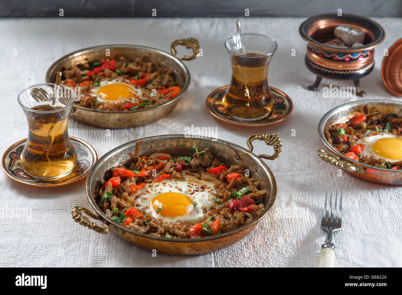 Fried egg with mince meat in traditional turkish pan, close view Stock ...