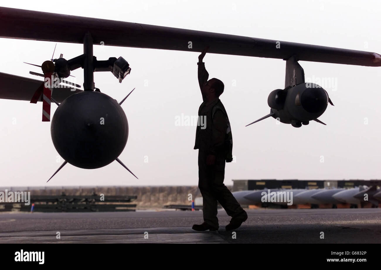British Ground crewman, based in Northern Kuwait, checking the wing of ...