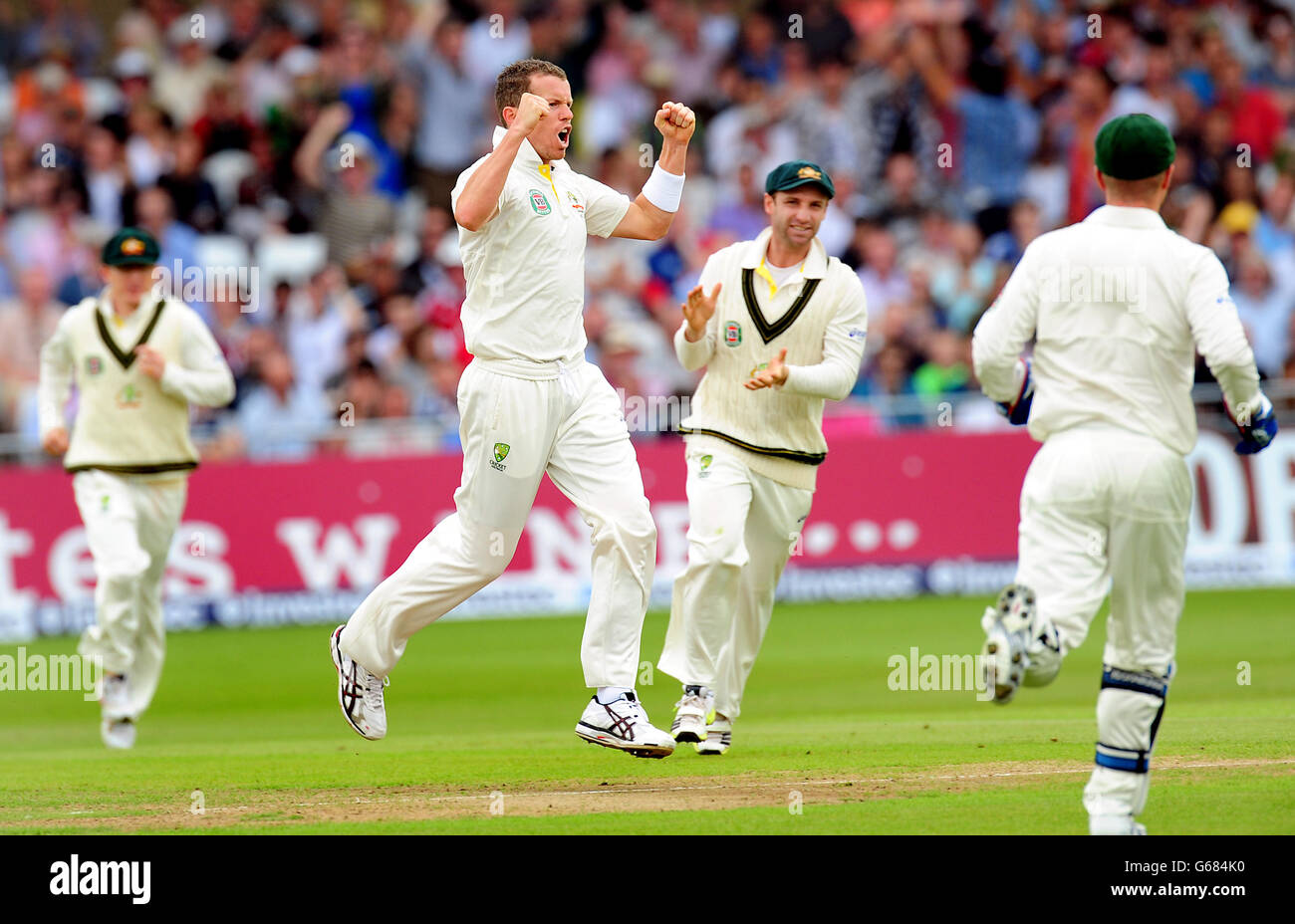 Peter Siddle celebrates after bowling Joe Root during day one of the ...