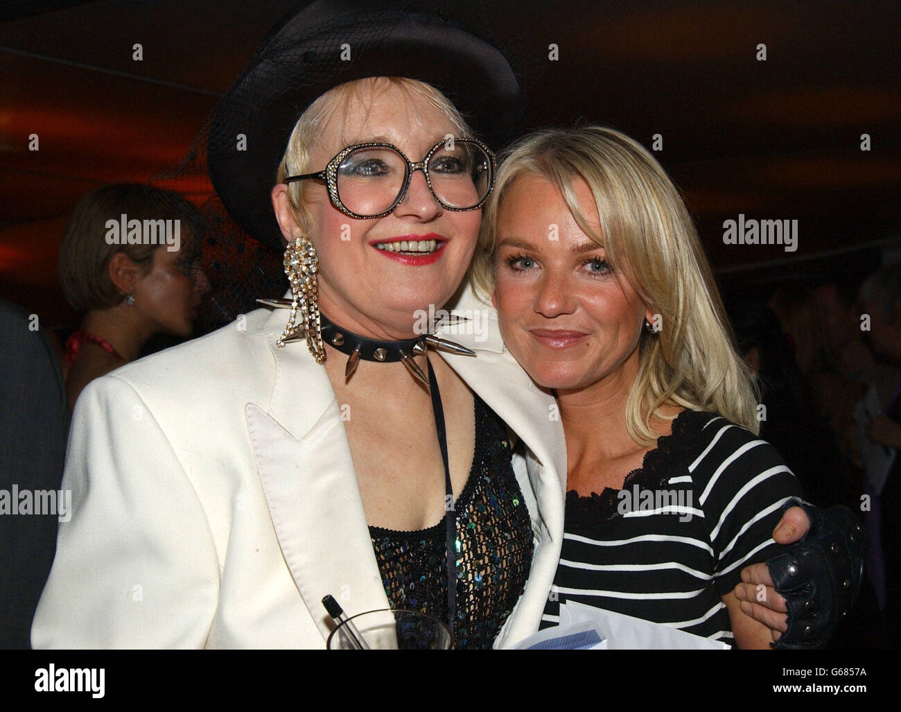 Celebrity smiling arm around actress glasses studded choker hi-res ...