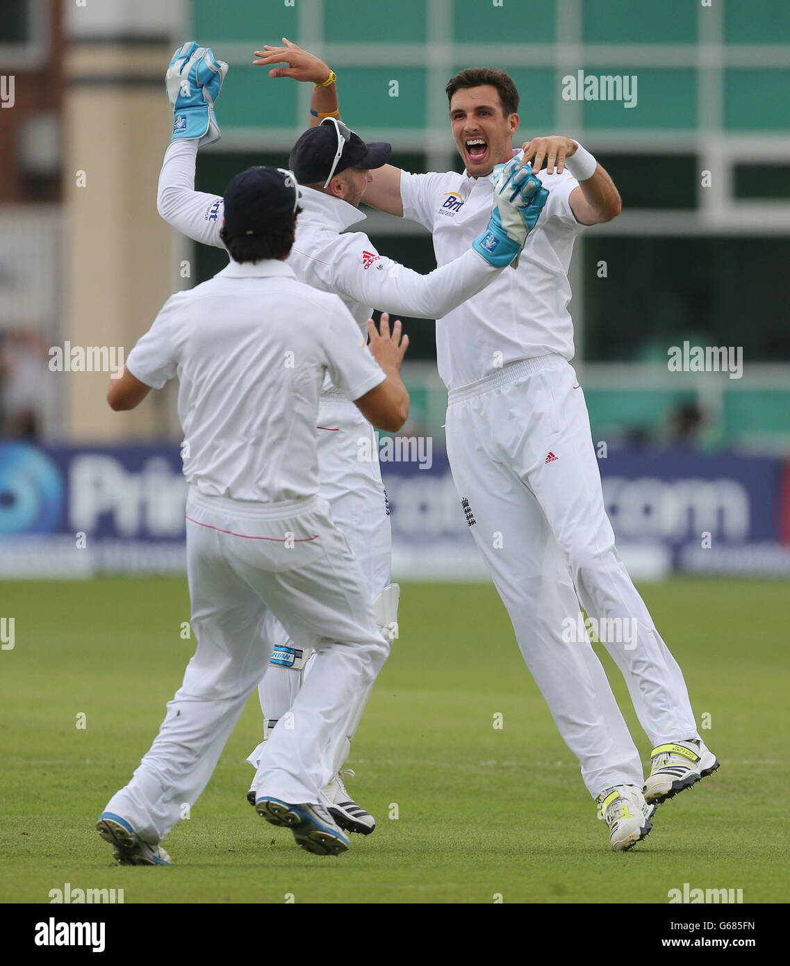 England's bowler Steven Finn celebrates taking wicket of Australia's Ed ...