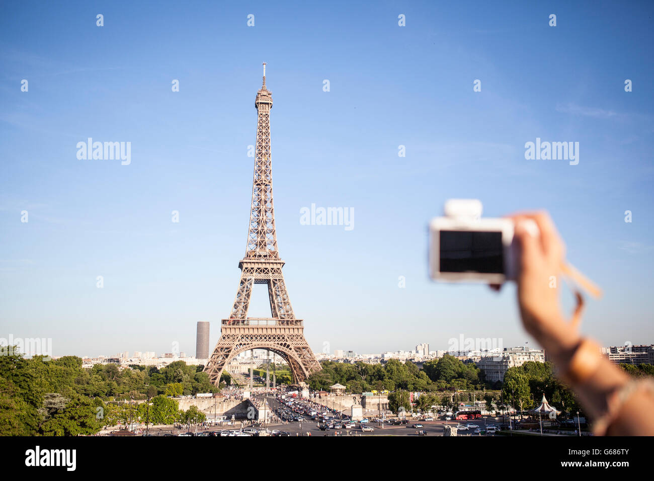 tourist taking photo of Eiffel Tower, Paris Stock Photo - Alamy