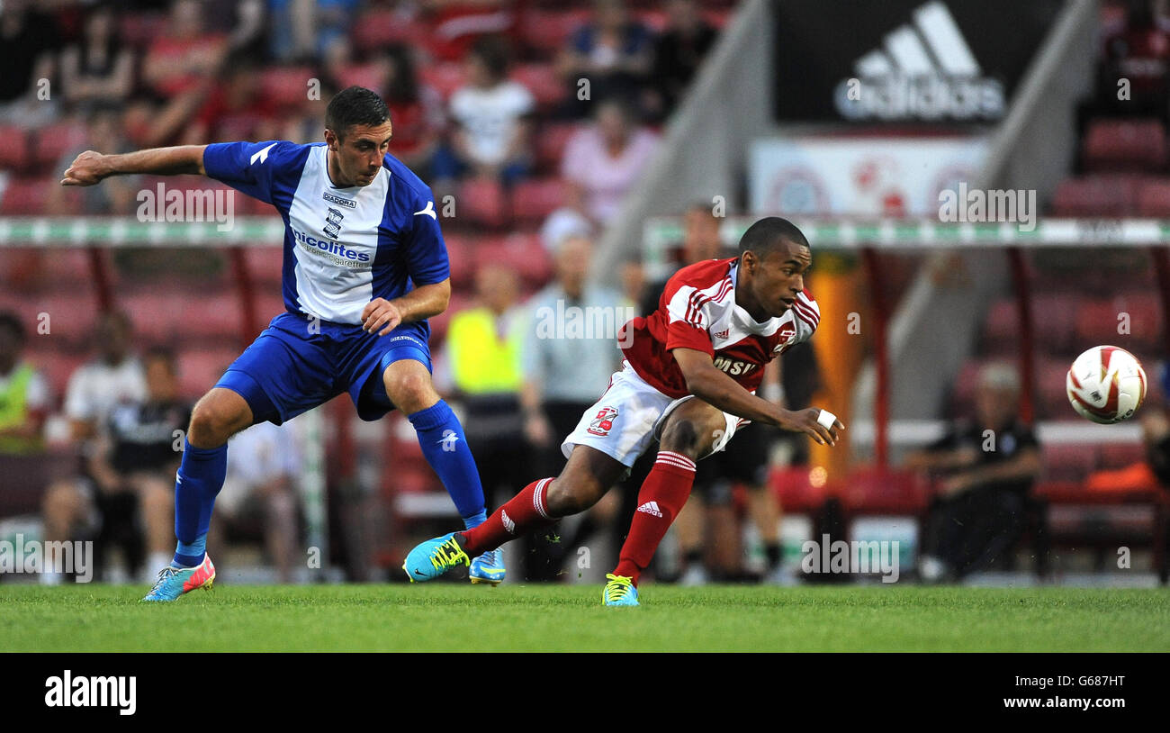 Swindon Town's Nathan Thompson (right) and Birmingham's Lee Novak (left ...