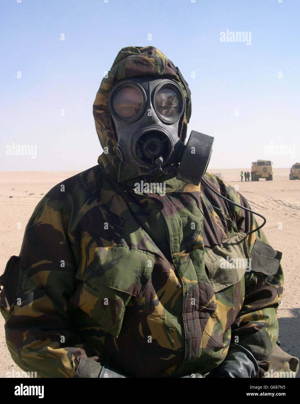 Wearing his nbc suit and respirator in camp coyote hi-res stock ...