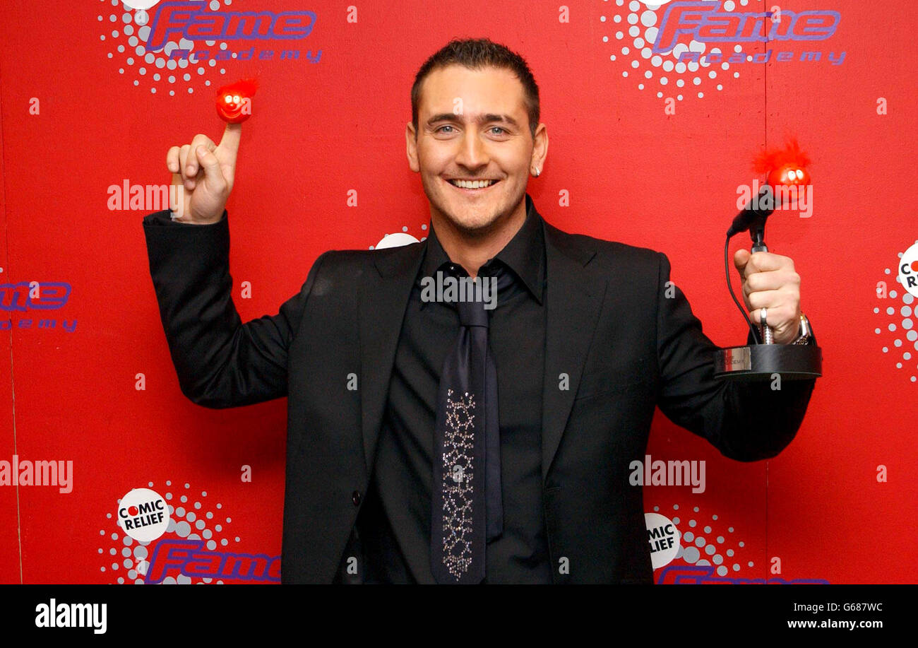 Actor Will Mellor poses for photographers after winning during the ...