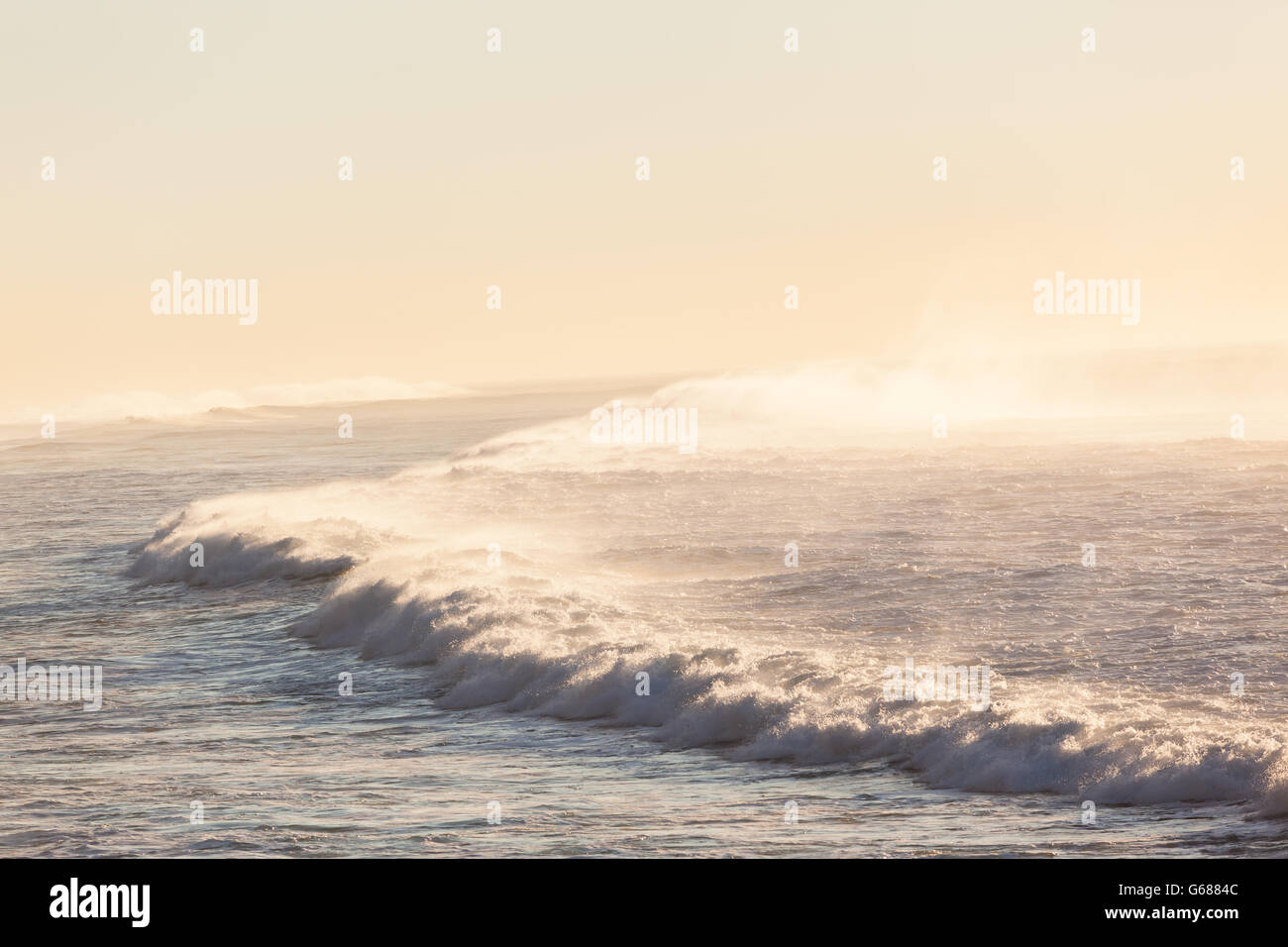 Ocean waves white water rolling towards beach coastline Stock Photo - Alamy