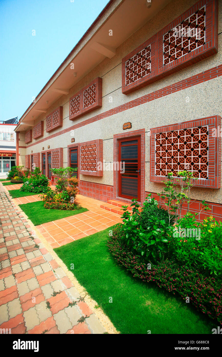 Seaview traditional quadrangle house Stock Photo - Alamy