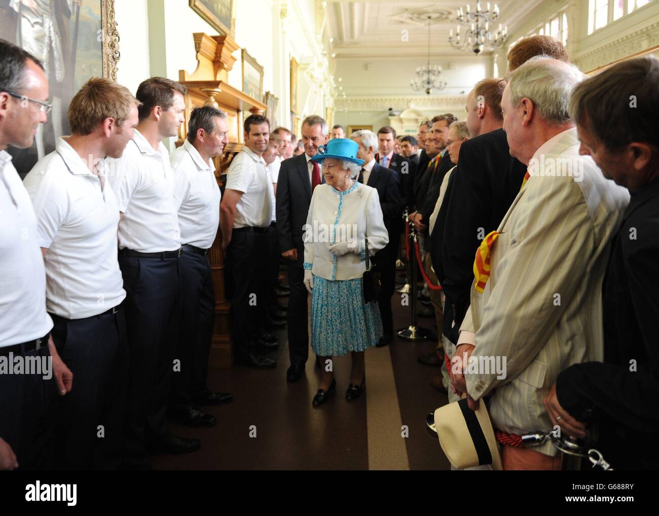 Queen Elizabeth II meets back room staff in the Long Room inside the ...