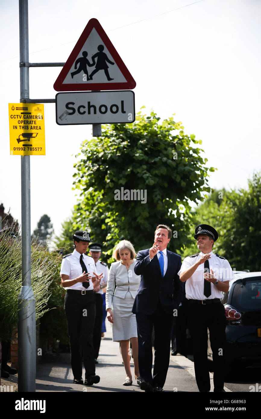 Prime Minister David Cameron and Home Secretary Theresa May with ...