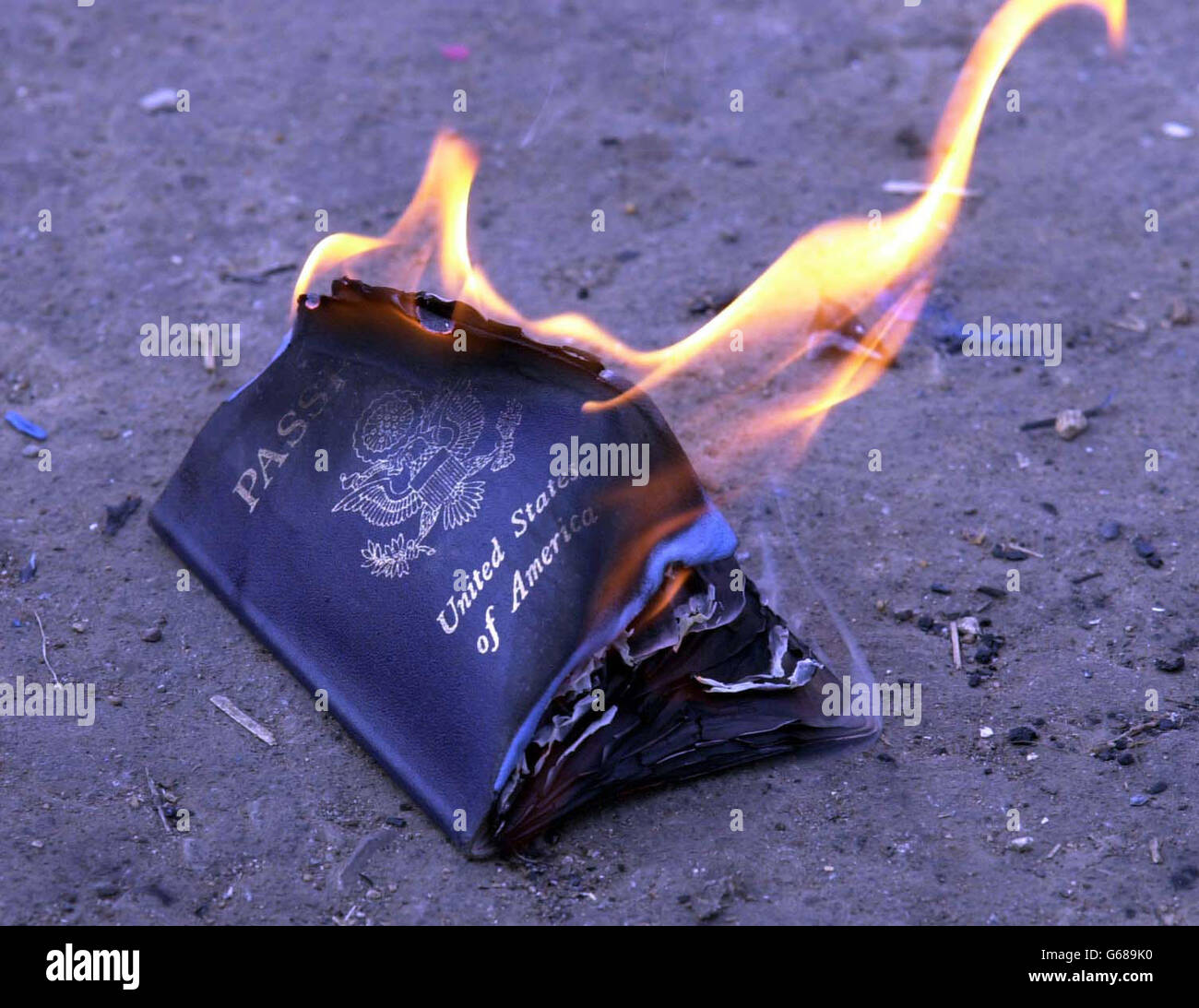 Burning American passport Stock Photo - Alamy