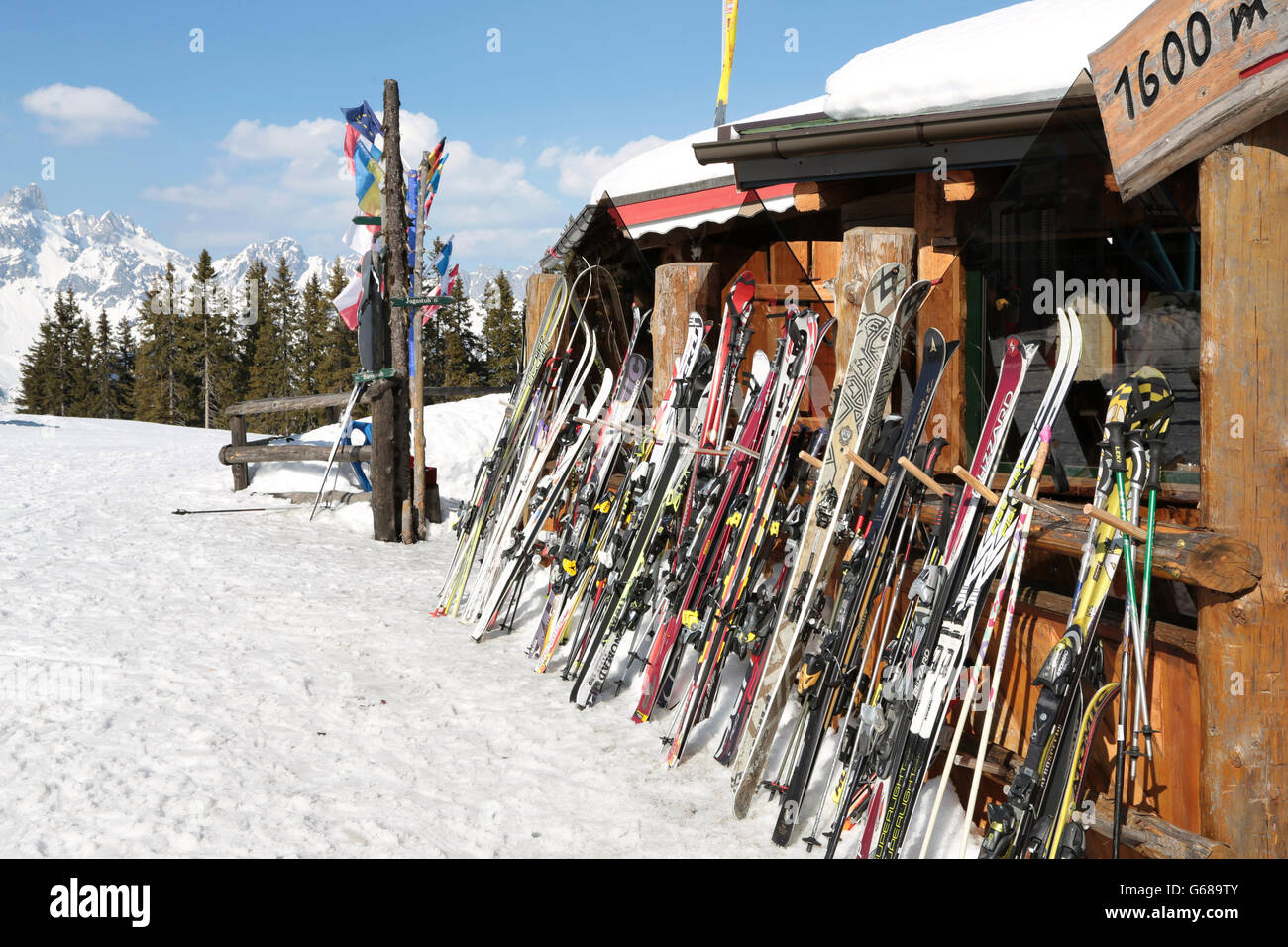 Skis next to a alpine restaurant in Filzmoos, Austria Stock Photo - Alamy
