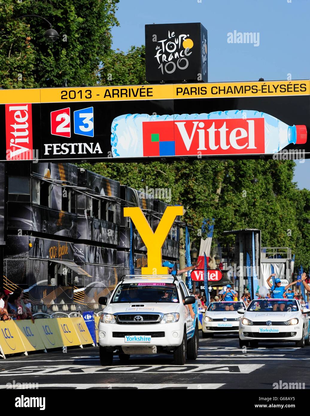 The Welcome to Yorkshire car makes its way across the finish line along ...