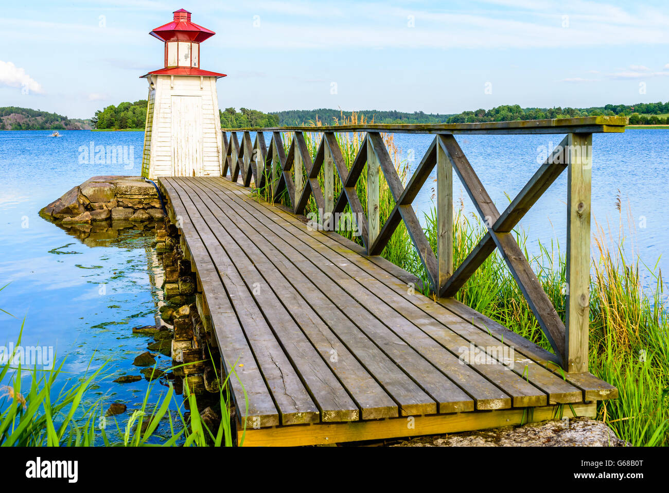 A very small lighthouse at the inlet of Gota canal in Mem, Sweden Stock ...