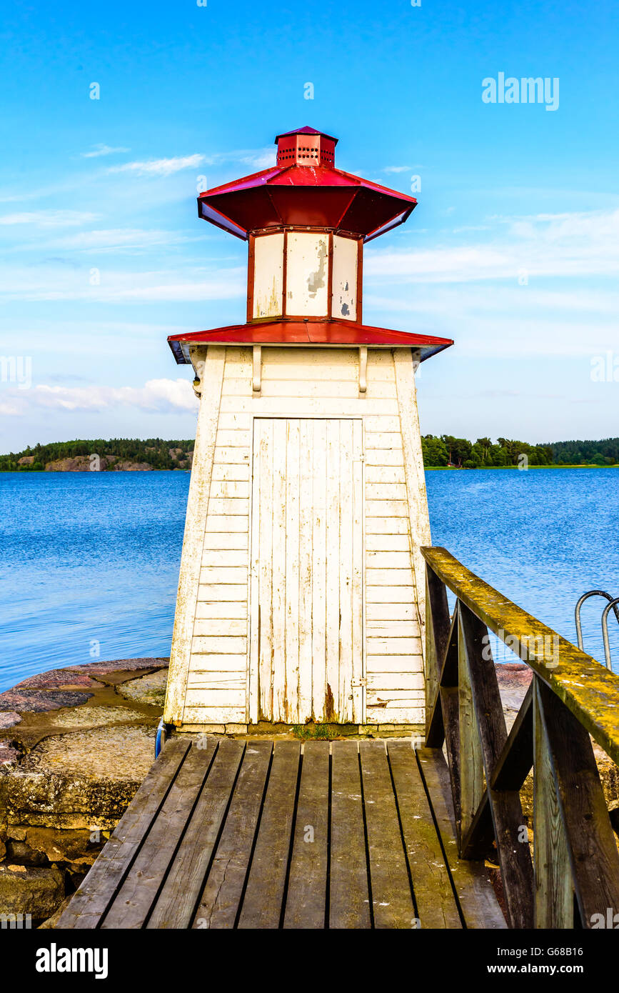A very small lighthouse at the inlet of Gota canal in Mem, Sweden Stock ...