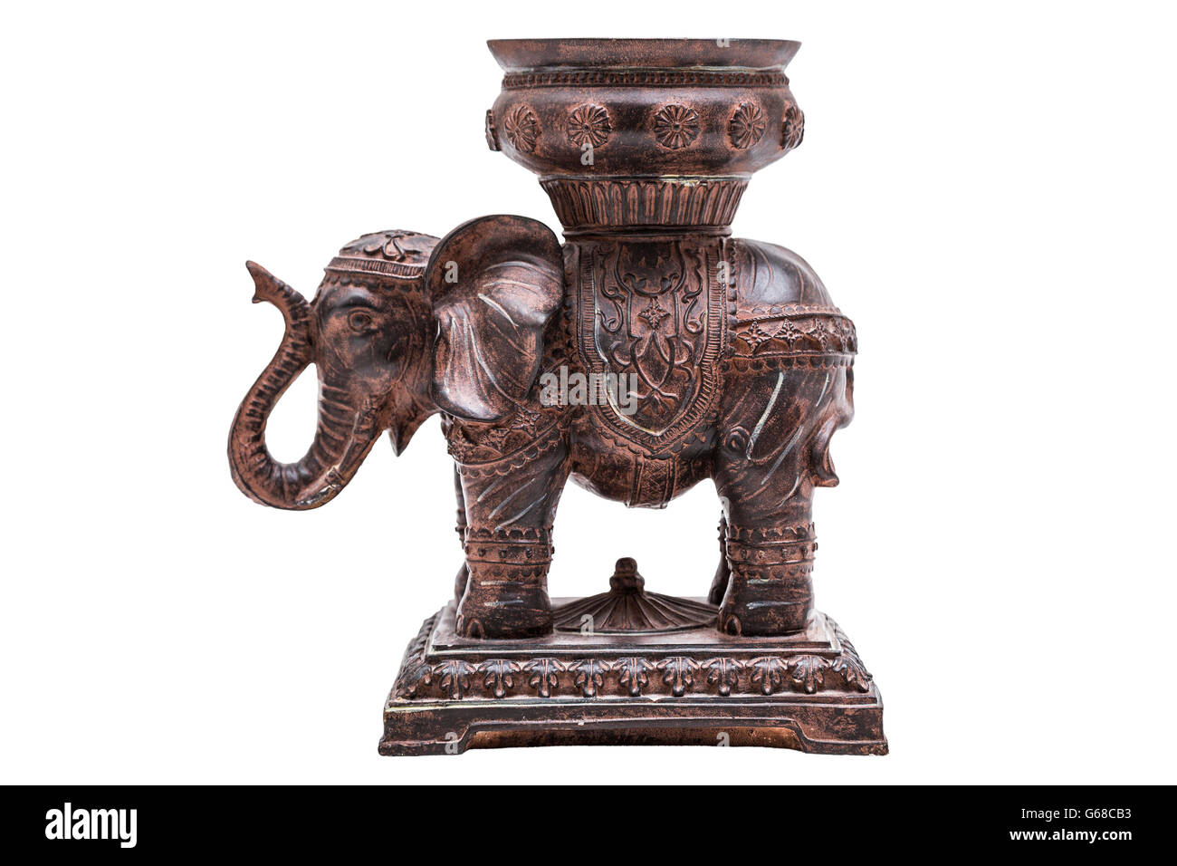 Handmade wooden brown elephant with saddle on isolated background Stock ...