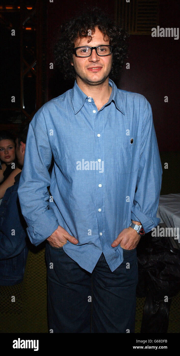 Showbiz premiere arriving glasses hands in pockets editor hi-res stock ...