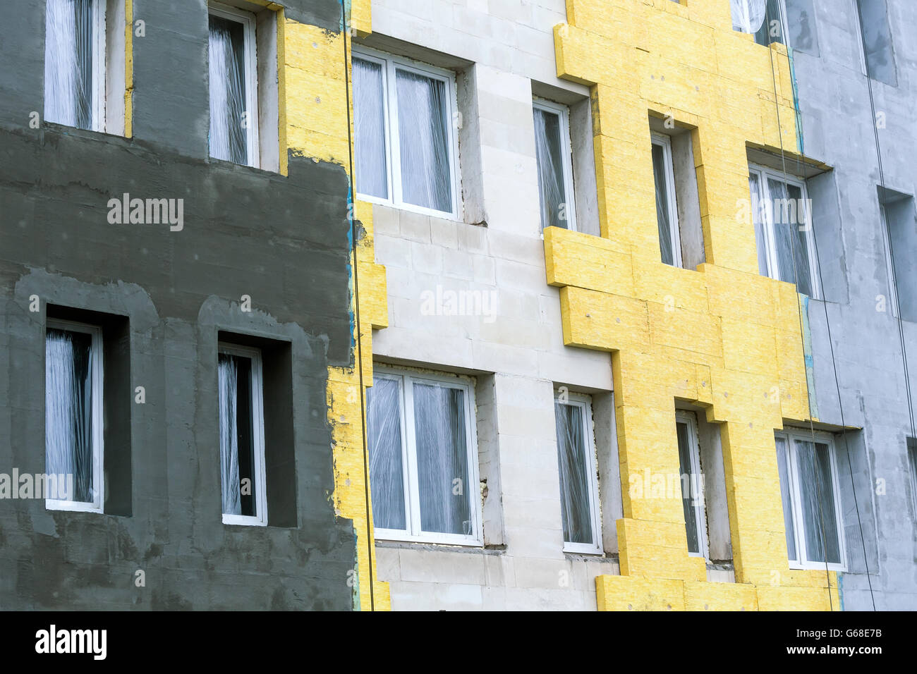 Concrete wall of building with insulation for thermal protection Stock ...