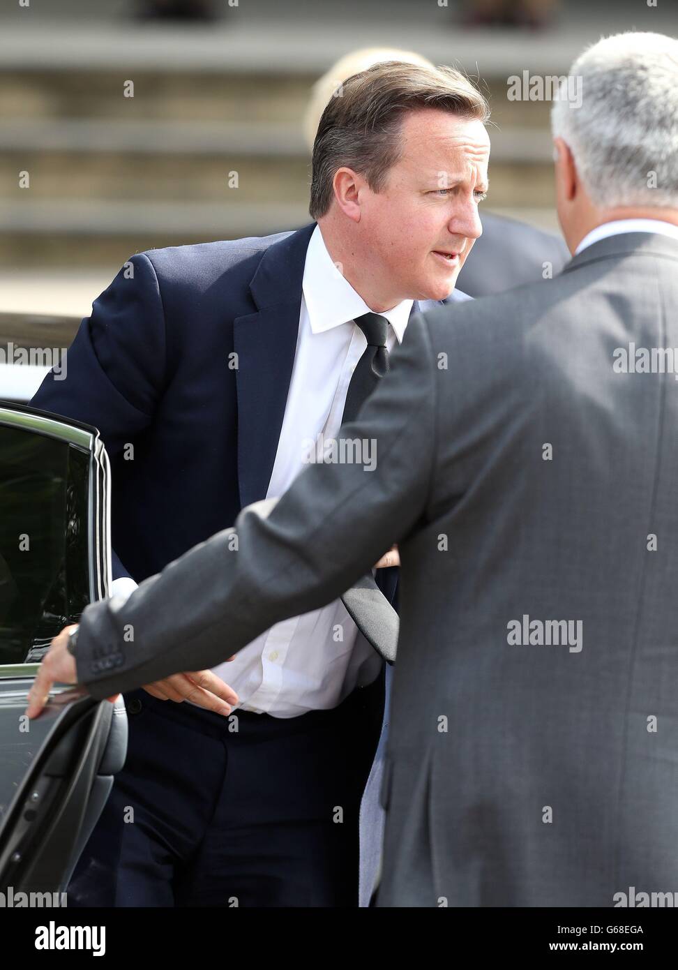 Prime Minister David Cameron arrives for the funeral service of ...