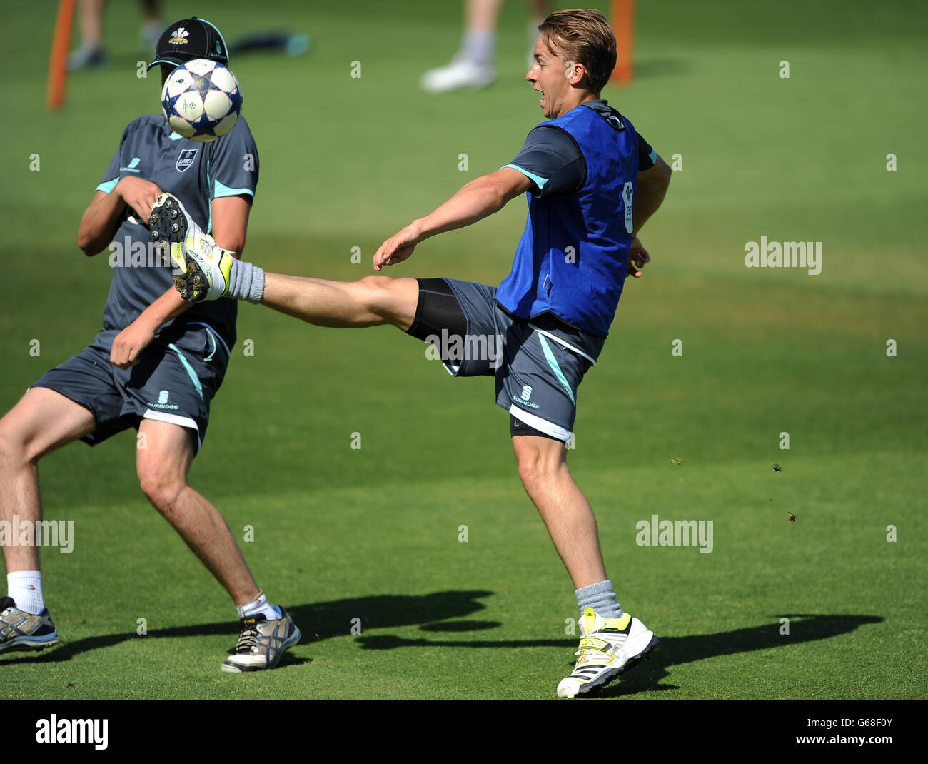 Surrey's Tom Curran plays football during the warm up Stock Photo - Alamy