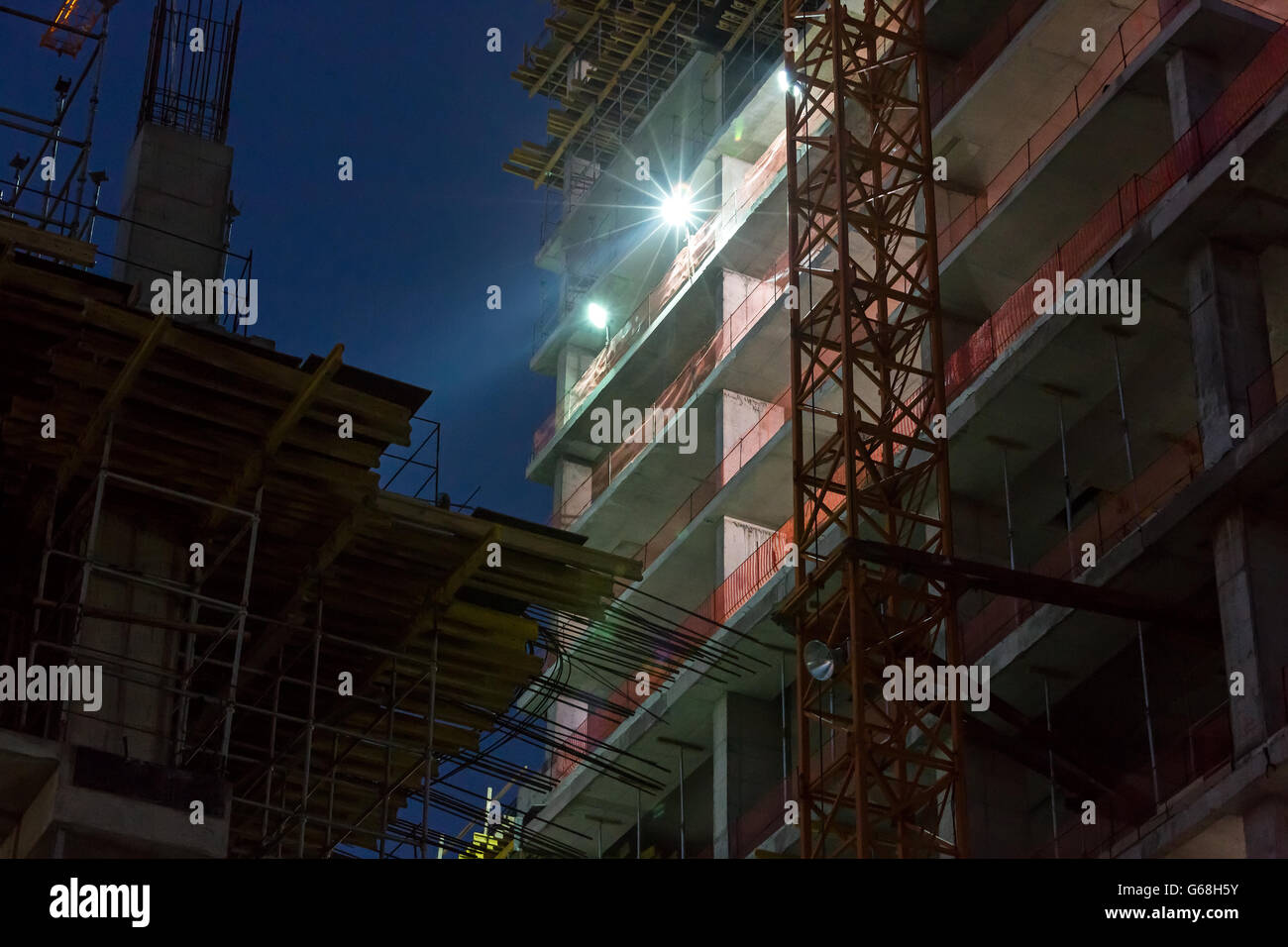 Night view of construction building site with tower crane Stock Photo ...