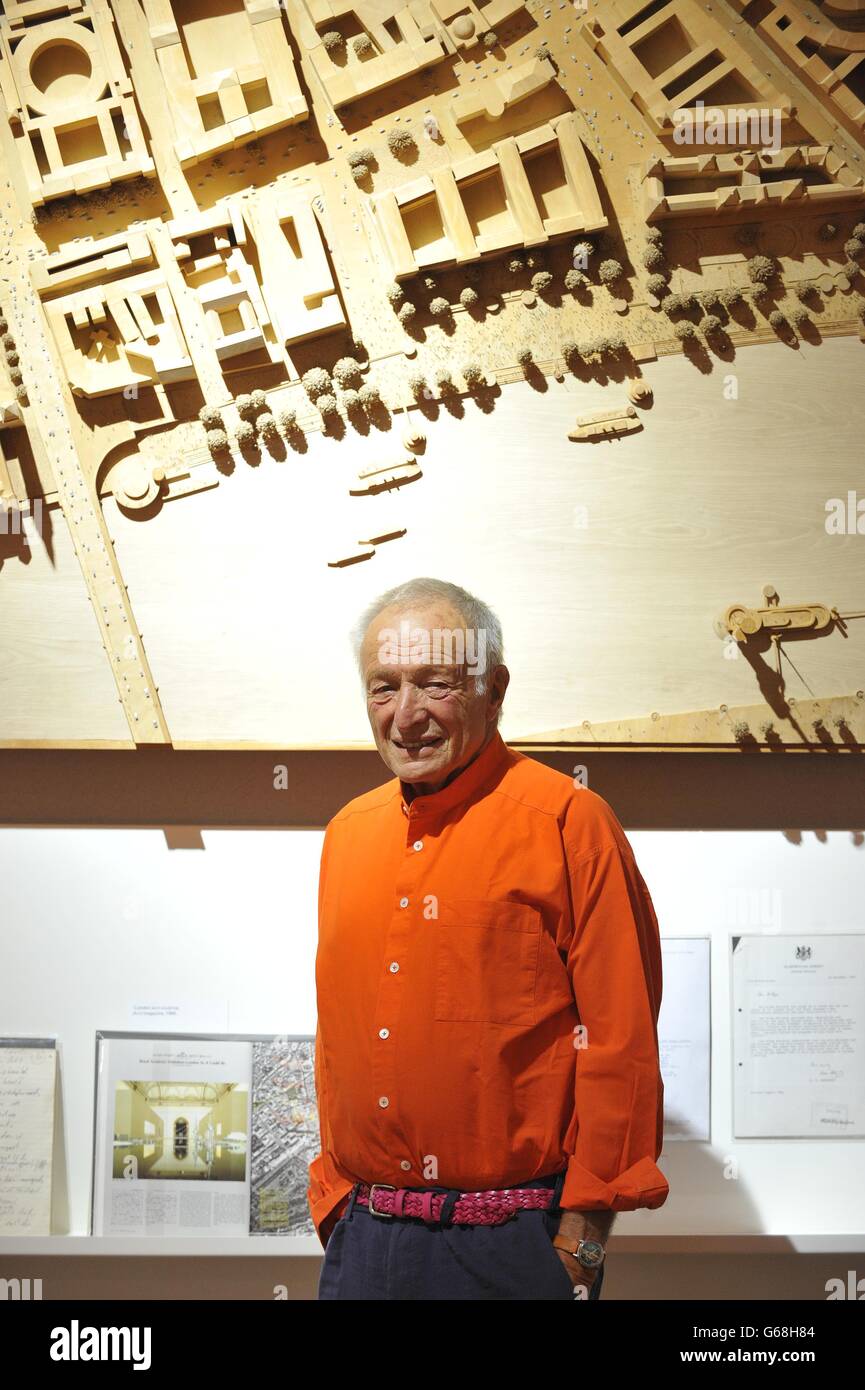 Architect Richard Rogers stands in front of a wooden model of his ...