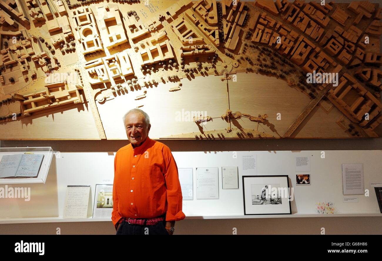Architect Richard Rogers stands in front of a wooden model of his ...