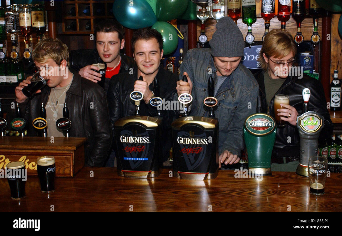 Celebrity music boy band pulling pint guinnnes smiling alumnicb2 hi-res ...