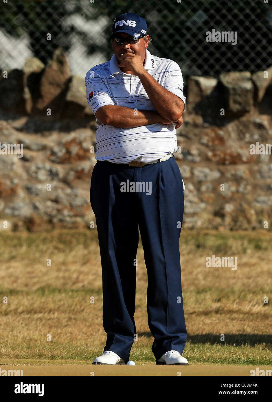 Argentina's Angel Cabrera ponders a putt on the ninth green during day ...