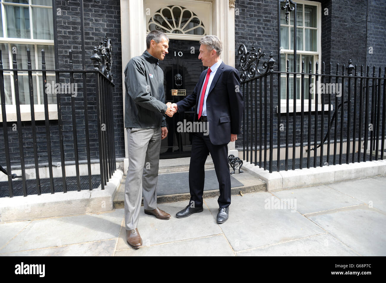 Simon talbot left outside downing street with conrad bird hi-res stock ...