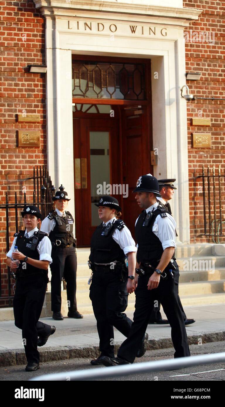 Police officers outside the Lindo Wing of St Mary's Hospital in London ...