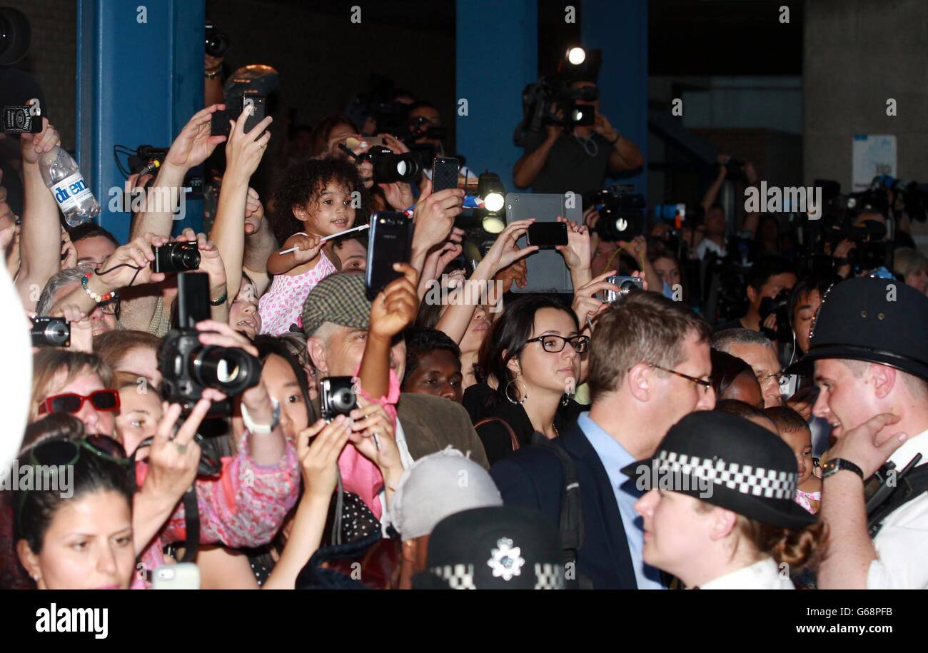 Baby in a crowd hi-res stock photography and images - Alamy