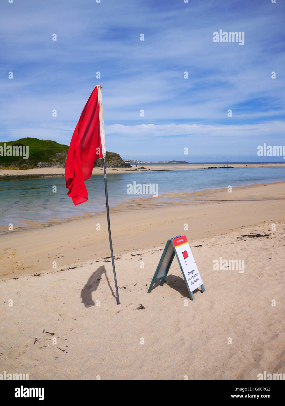 Red warning flag flying hi-res stock photography and images - Alamy
