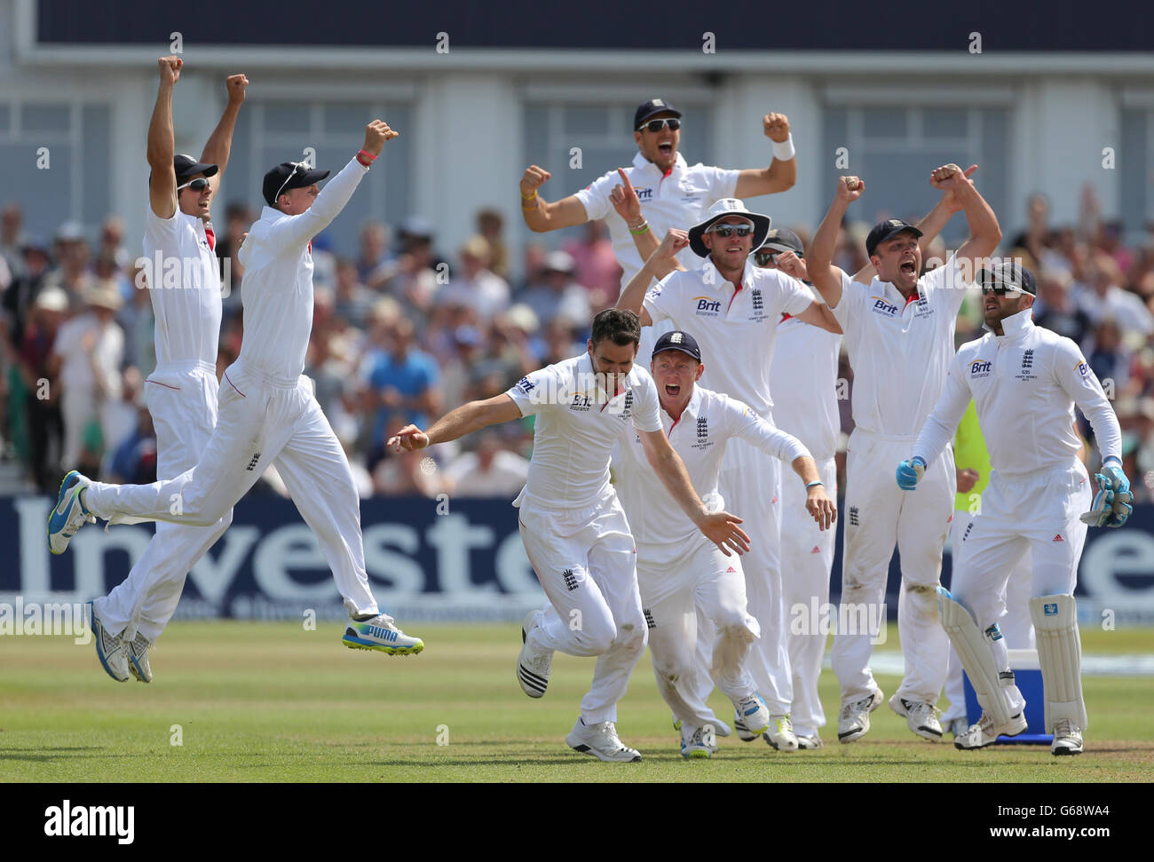 England bowler James Anderson (front ) celebrates with the the rest of ...