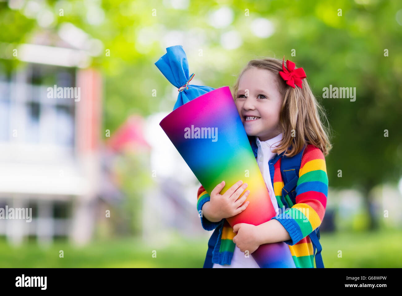 Happy child holding traditional German candy cone on first school day ...