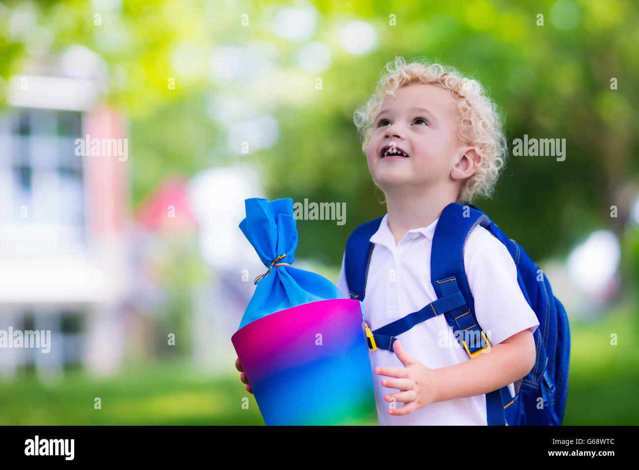 Happy child holding traditional German candy cone on first school day ...